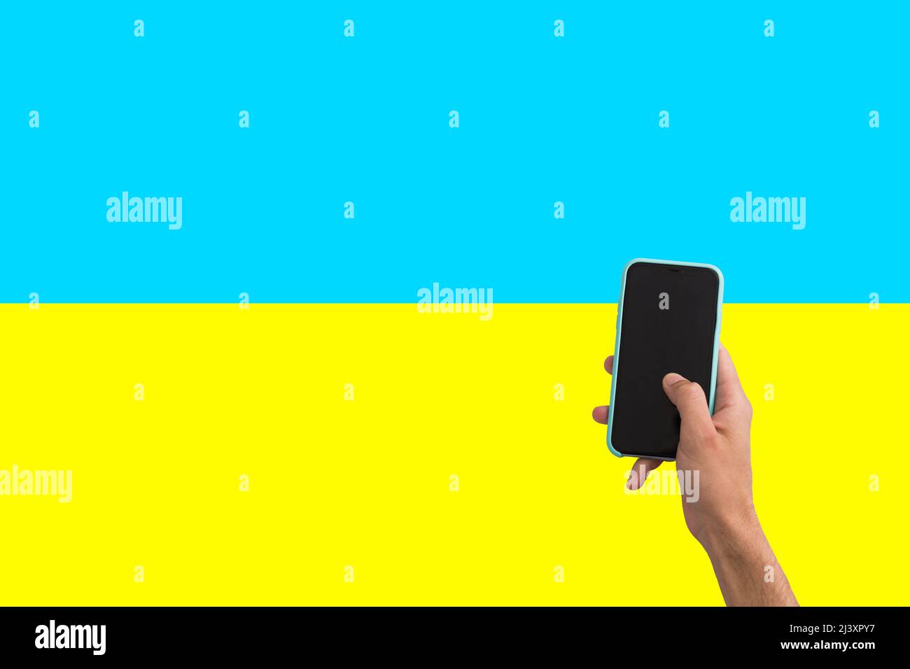 Illustration of a hand holding a smartphone with the flag of Ukraine ...
