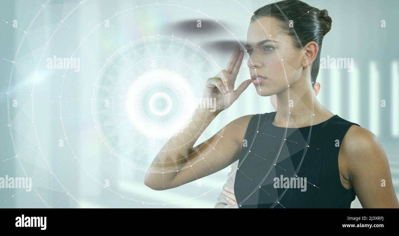 Round scanner over caucasian businesswoman touching invisible glasses ...