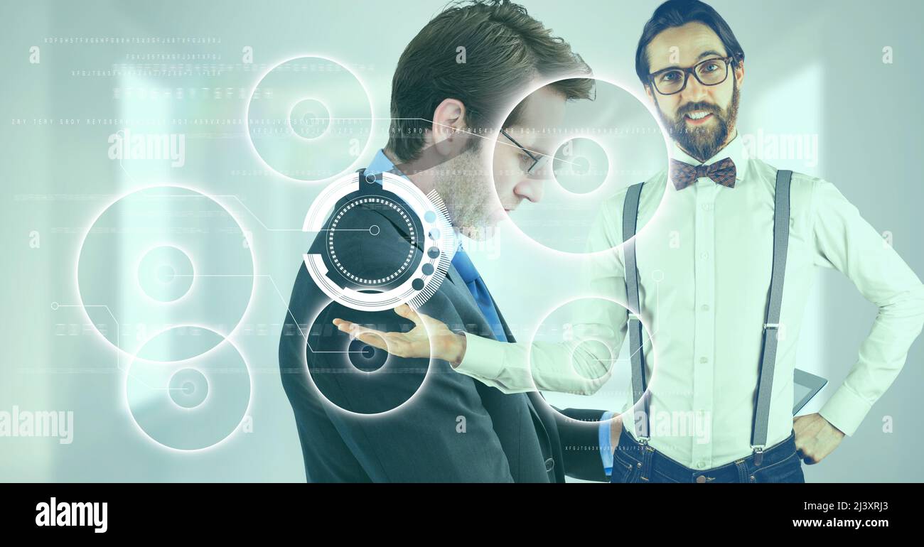 Multiple round scanners over man holding an invisible object against ... Multiple round scanners over man holding an invisible object against ...