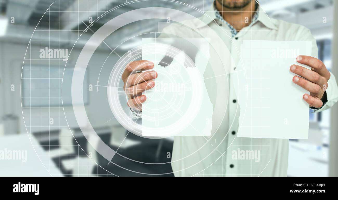 Scope scanning over mid section of a man holding blank papers at office ...