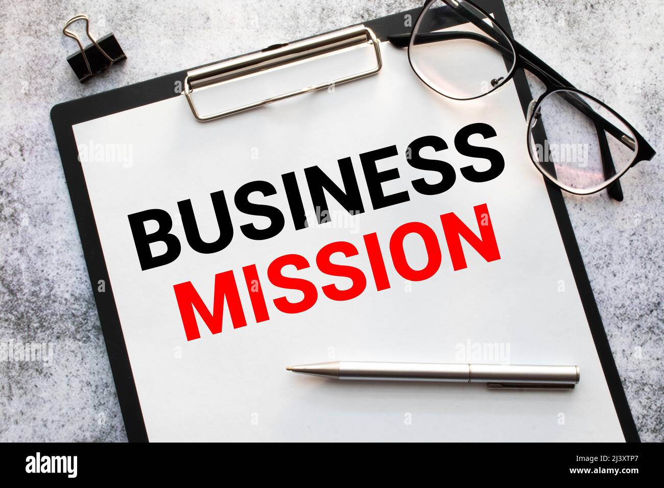 Text mission possible on white paper sheet and marker on businessman ...
