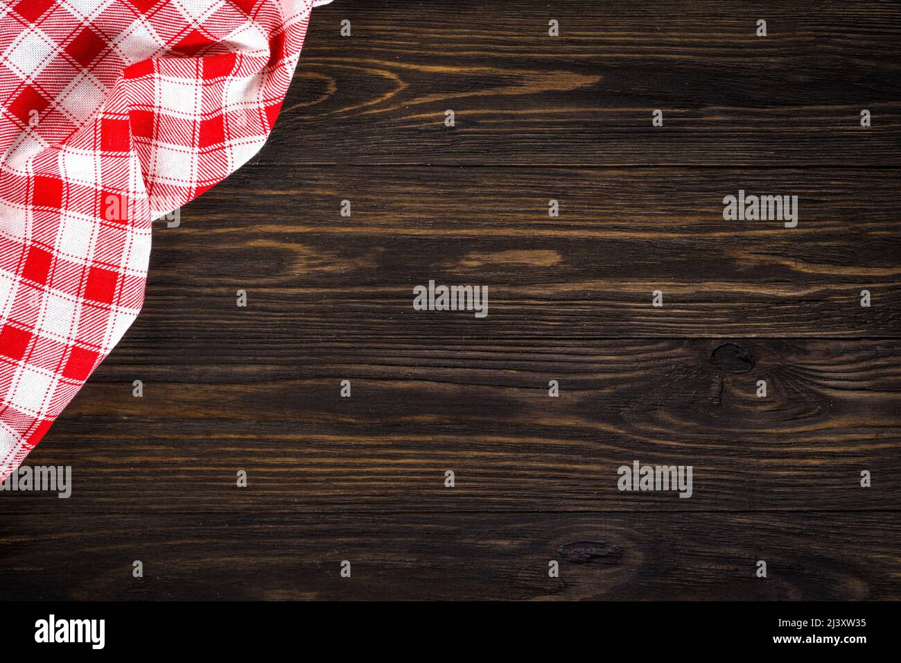 Kitchen table with red plaid tablecloth Stock Photo - Alamy