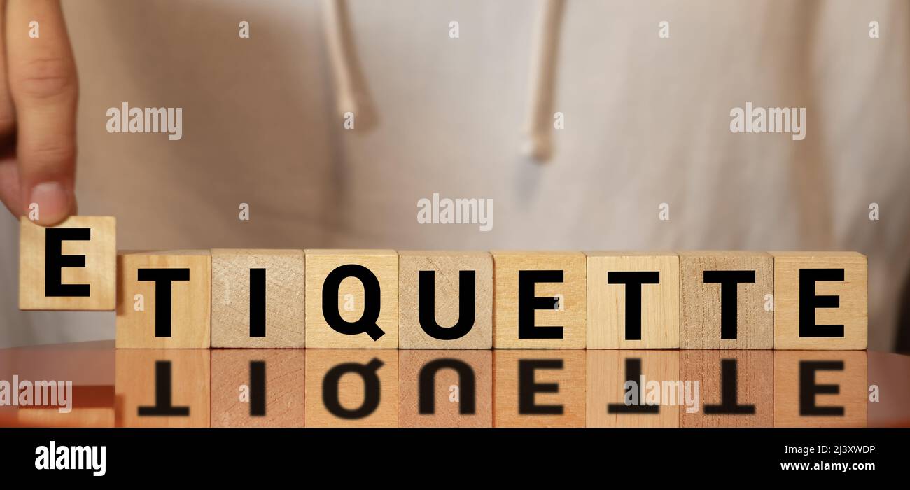 ETIQUETTE word made with building blocks Stock Photo - Alamy