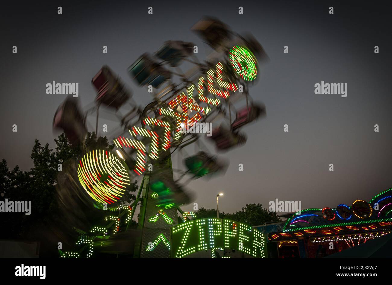 Zipper carnival ride hi-res stock photography and images - Alamy