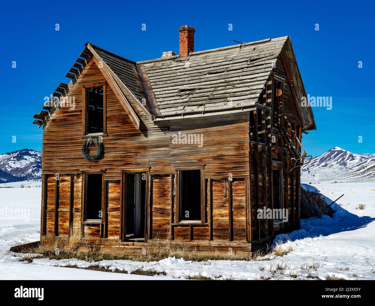 Snow on field surrounding a weathered old homestead Fairfield Idaho ...