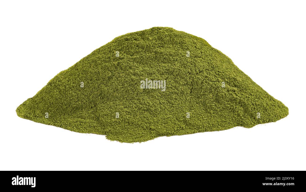 Moringa powder heap isolated on white background Stock Photo - Alamy
