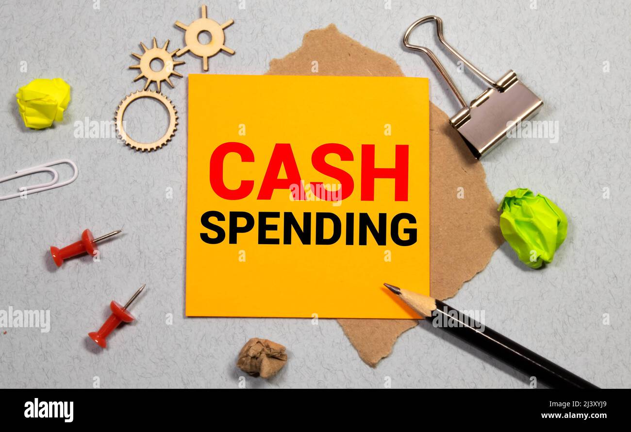 Cash Spending text written on notebook with pen and chart Stock Photo ...