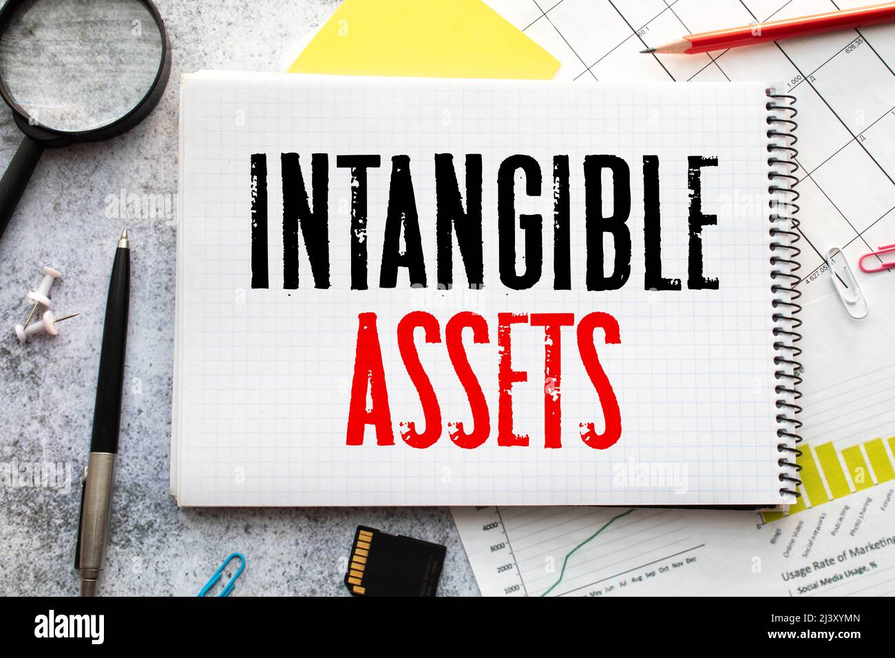 Intangible Asset text written on a notebook with pencils Stock Photo ...