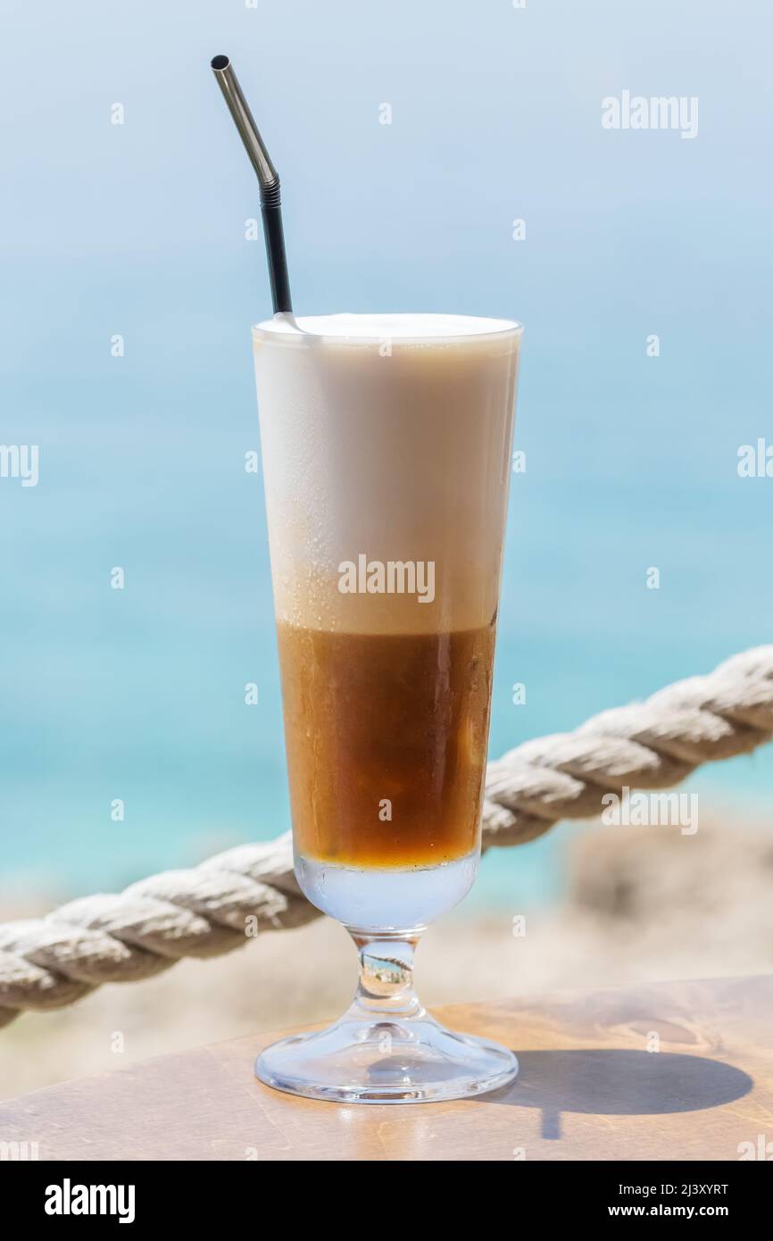 Morning coffee latte by the sea Stock Photo - Alamy