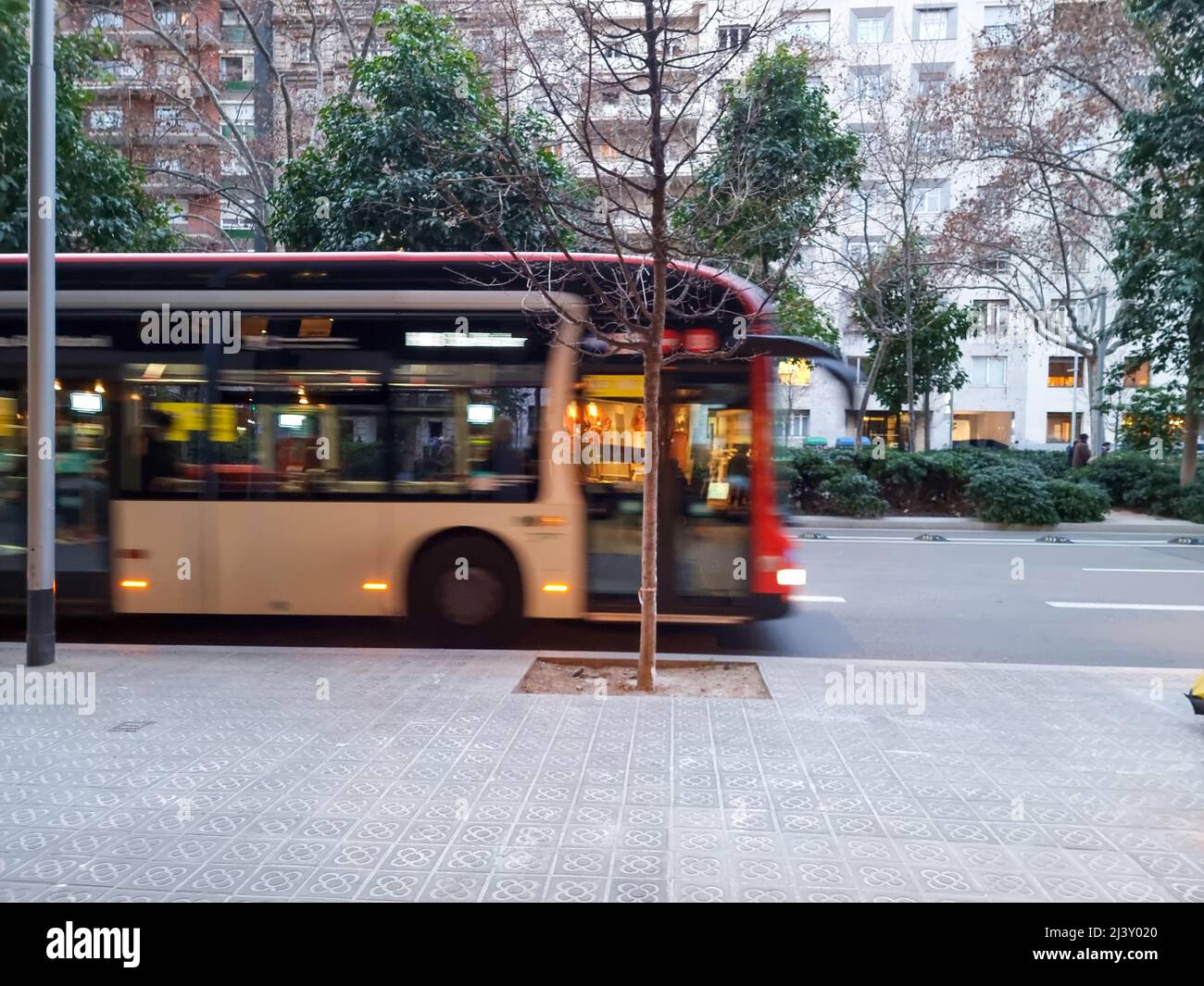 Bus in motion in the city of Barcelona, Spain Stock Photo - Alamy