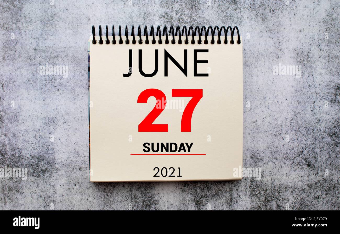 June 27th. Day 27 of month, Calendar date. Close-Up Blank Yellow paper ...