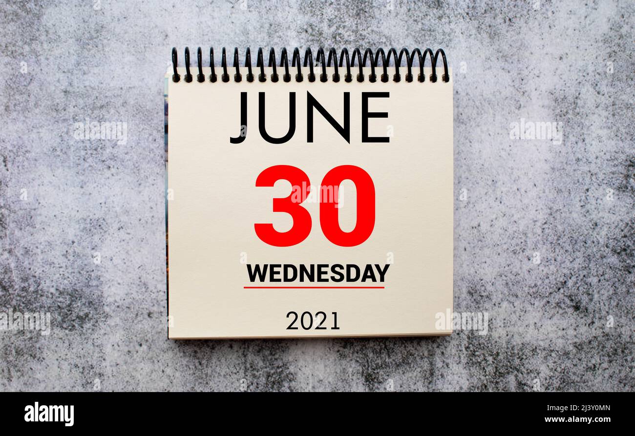 Save the Date written on a calendar - June 30 Stock Photo - Alamy