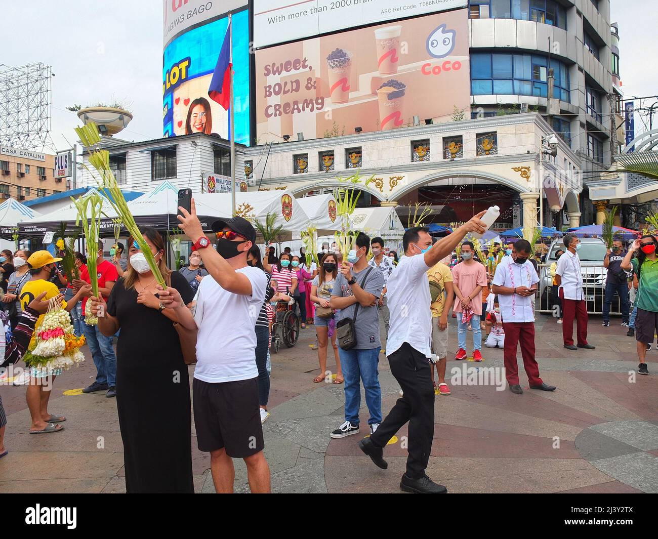 Manila, Philippines. 10th Apr, 2022. A Quiapo Lay Minister administers ...