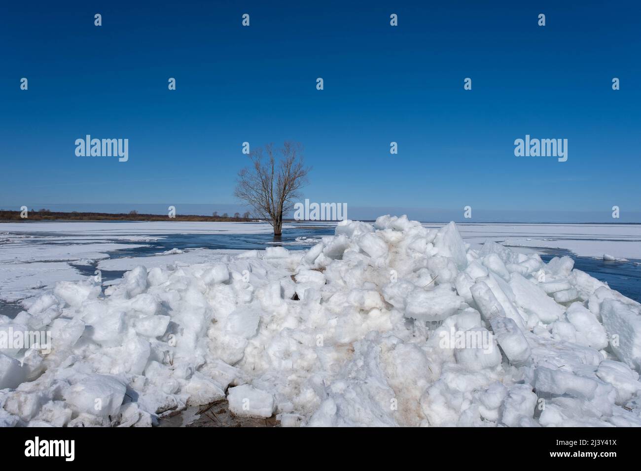 spring landscape from the lake shore, white ice cubes, blue sky, Lake ...