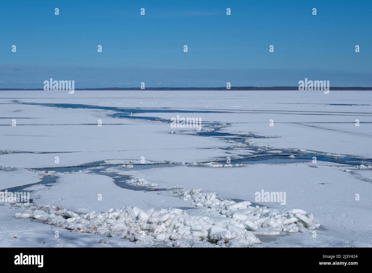 spring landscape from the lake shore, white ice cubes, blue sky, Lake ...