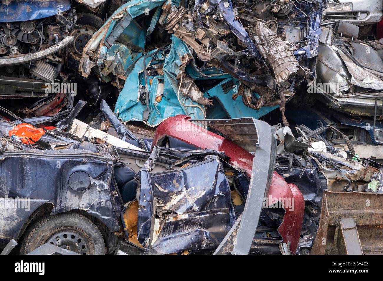 Stacked crushed cars going to be shredded in a recycling facility Stock ...