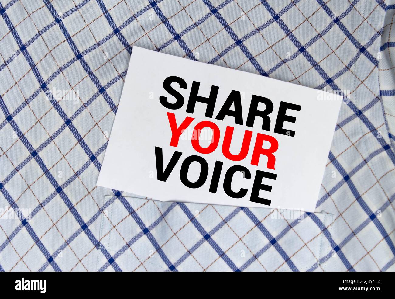 share your voice written over sticky. room for text Stock Photo - Alamy