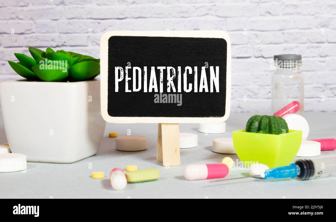 text pediatrician on white paper Stock Photo - Alamy