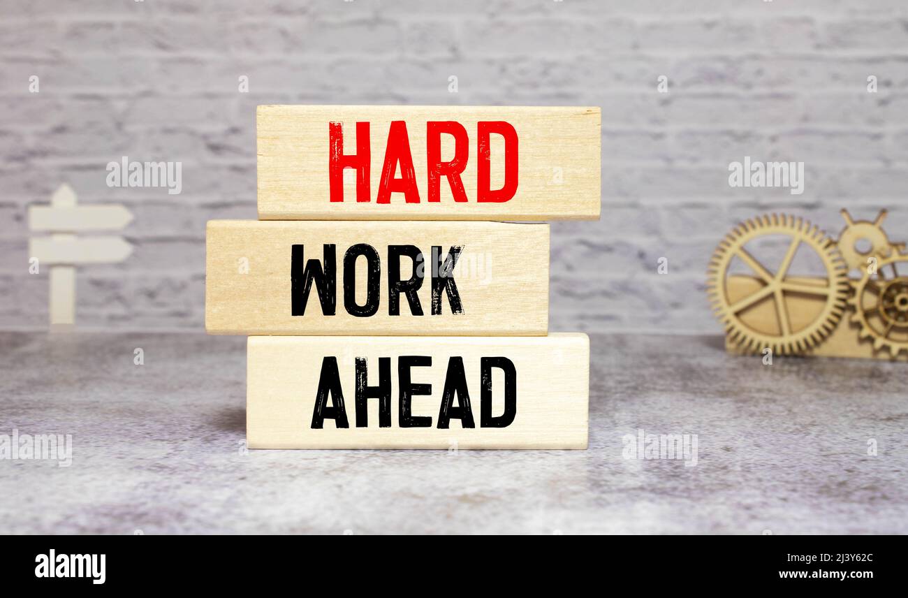 Hard Work Ahead sign, bisiness and job concept Stock Photo - Alamy