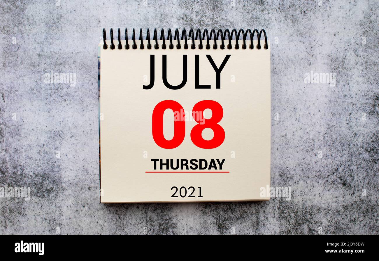 Wall calendar with a red pin - July 08 Stock Photo - Alamy