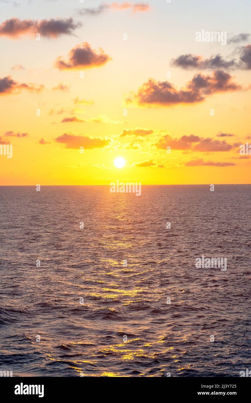 Sun setting over sea from Marella Explorer 2 cruise ship, Caribbean Sea ...