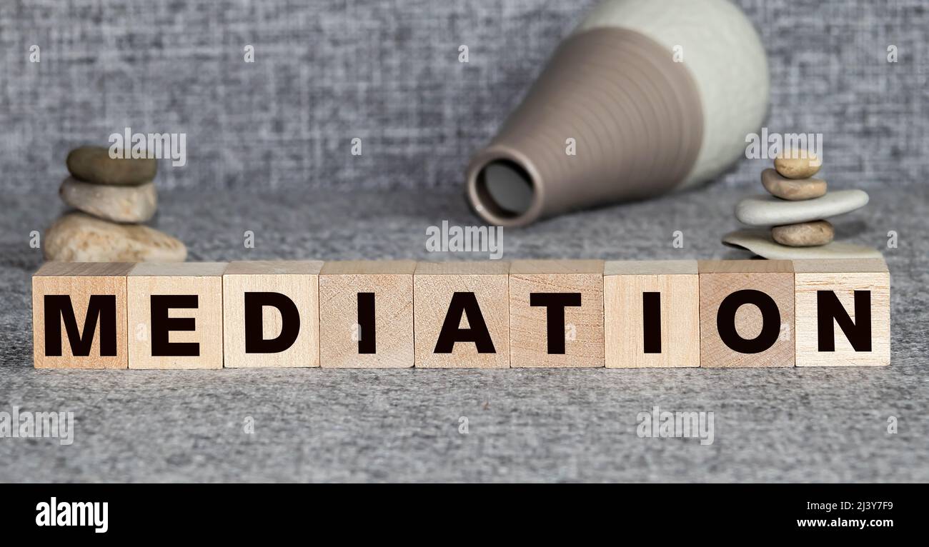 Mediation word from wooden blocks on desk Stock Photo - Alamy