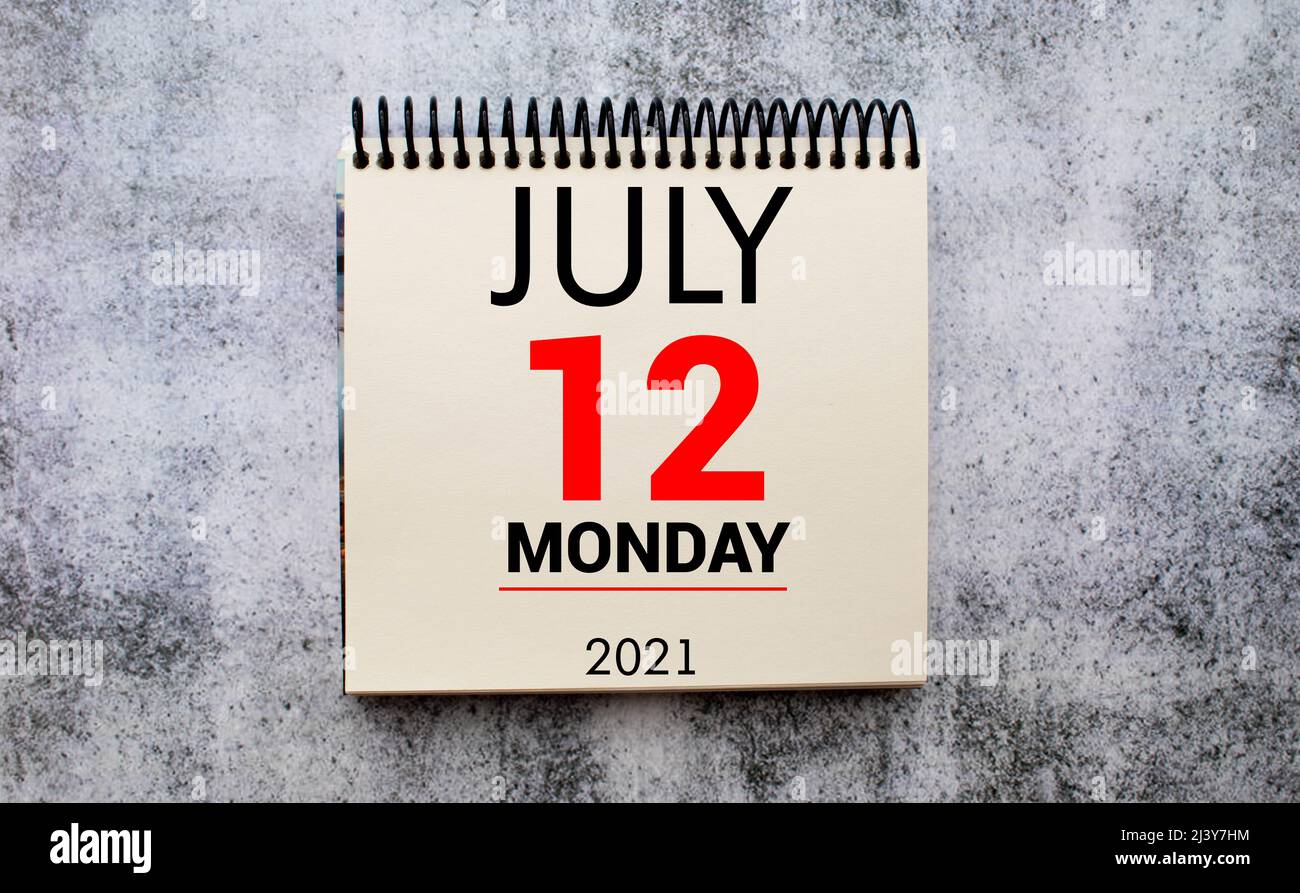 Save the Date written on a calendar - July 12 Stock Photo - Alamy