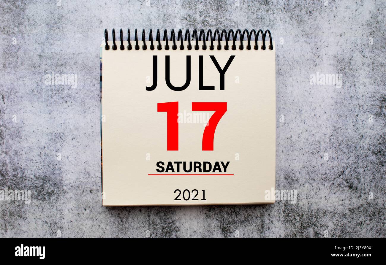 Save the Date written on a calendar - July 17 Stock Photo - Alamy