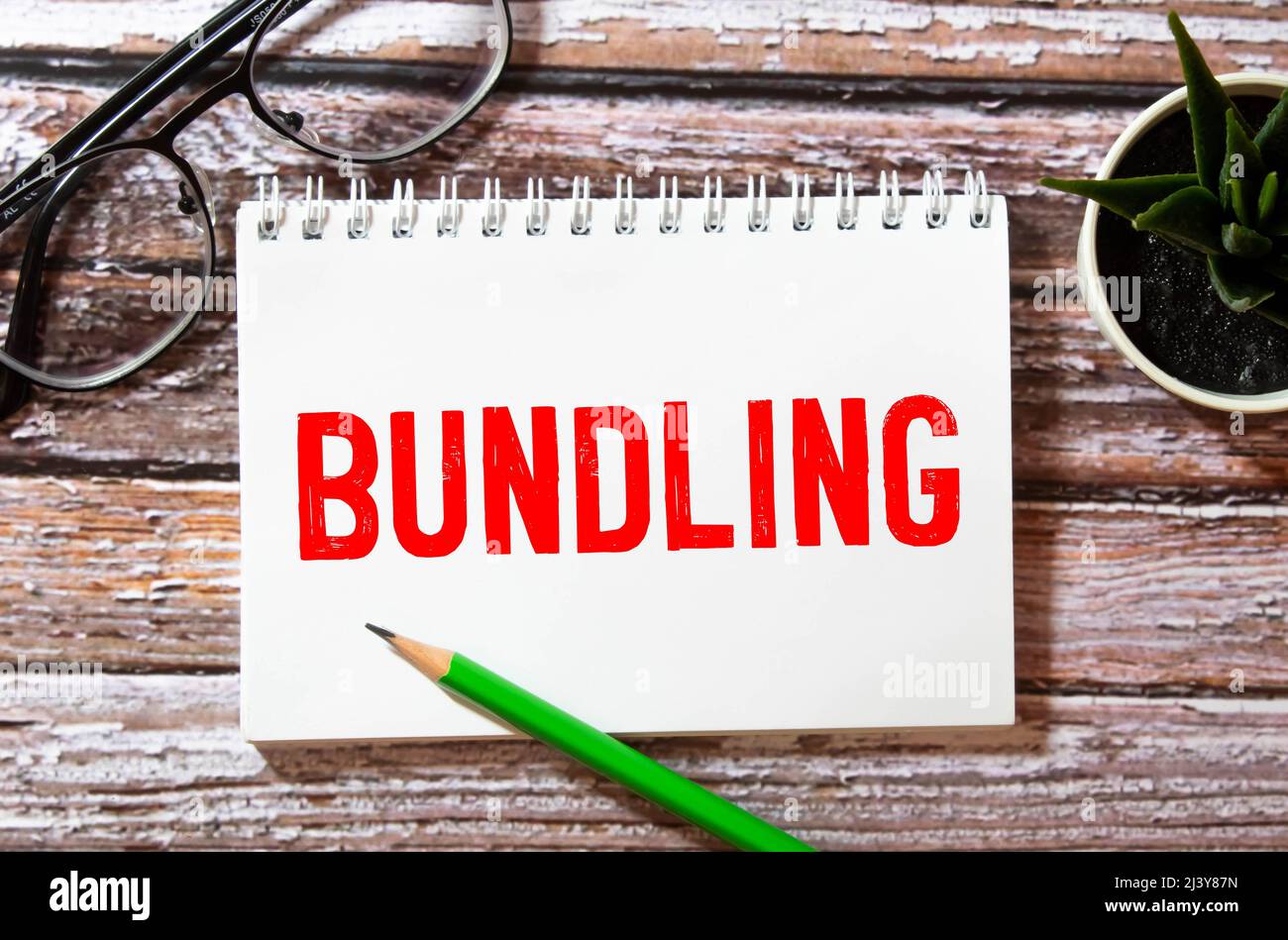 the word of BUNDLE on building blocks concept Stock Photo - Alamy
