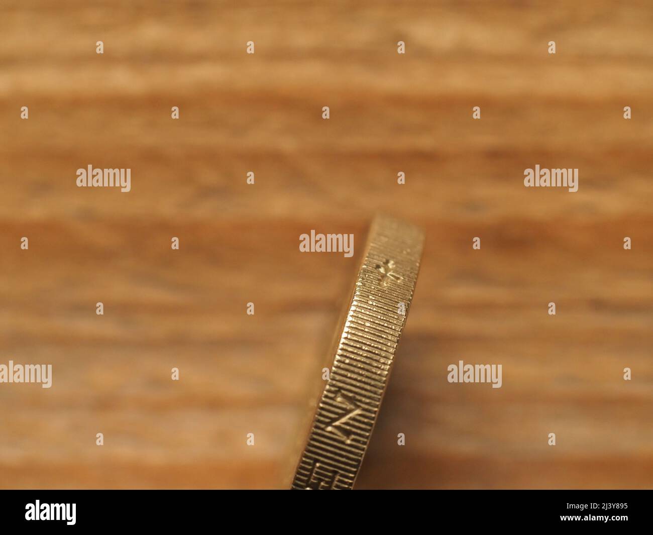 one pound coin side view, currency of the United Kingdom Stock Photo ...