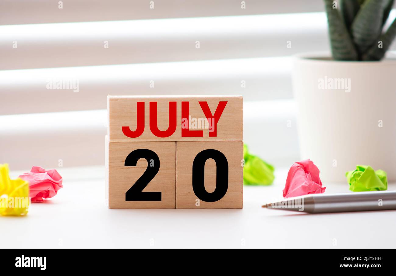July 20, Cover design with number cube on a white background and ...