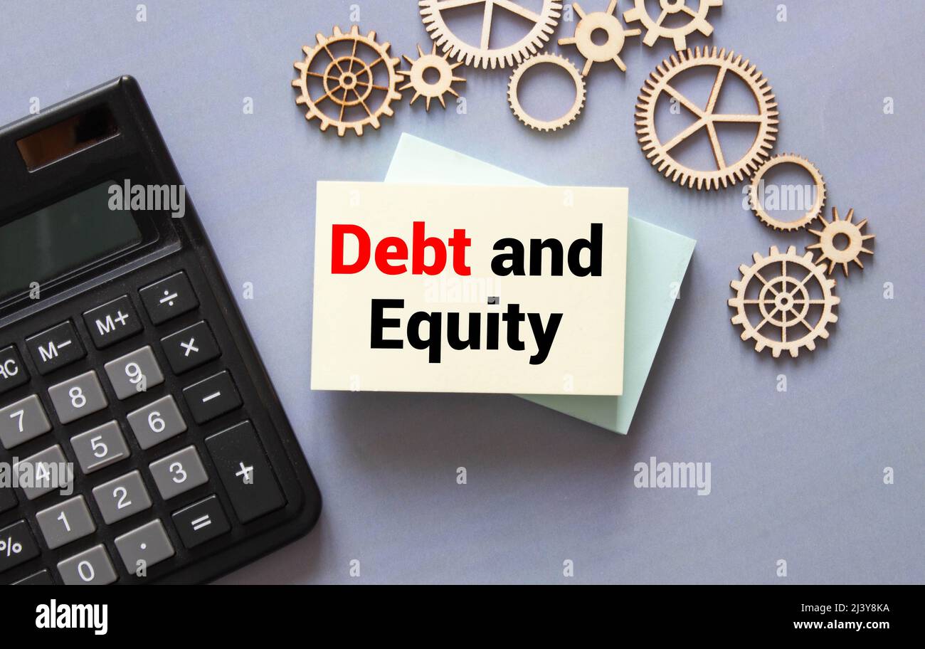 Businessman hand drawing debt and equity balance concept Stock Photo ...