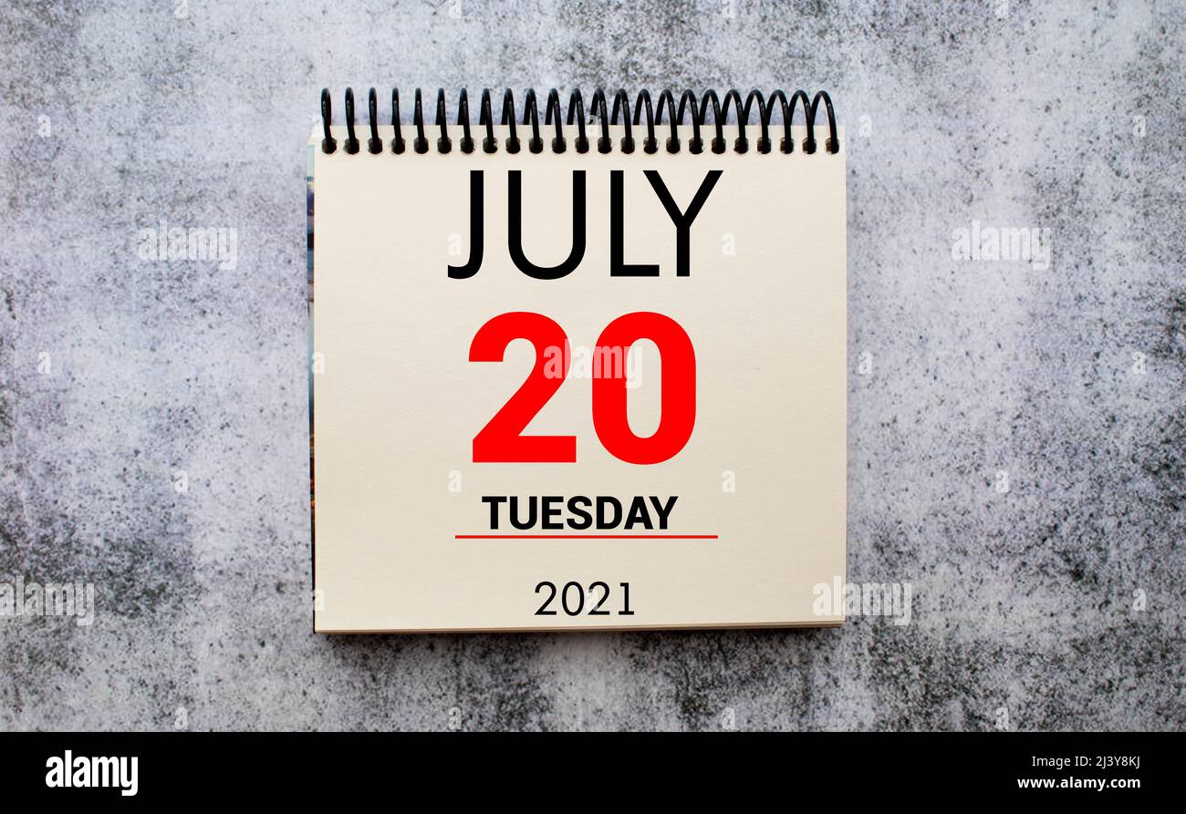 Save the Date written on a calendar - July 20 Stock Photo - Alamy