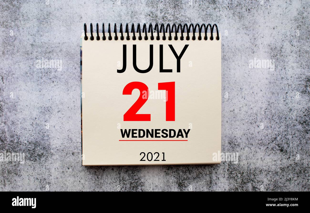 Save the Date written on a calendar - July 21 Stock Photo - Alamy