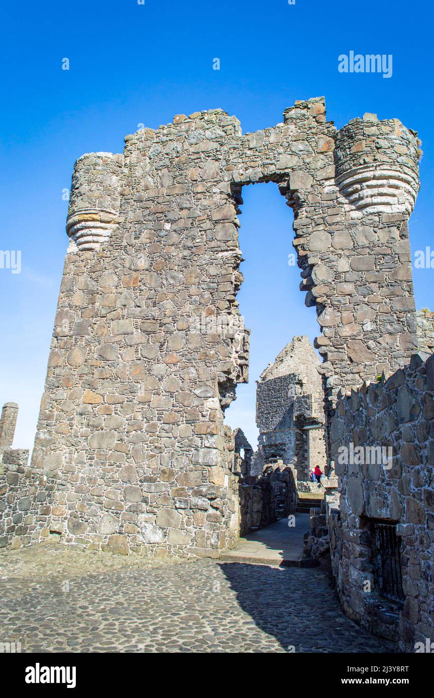 Famous Dunluce Castle (gate house) ruins in a sunny day Stock Photo - Alamy