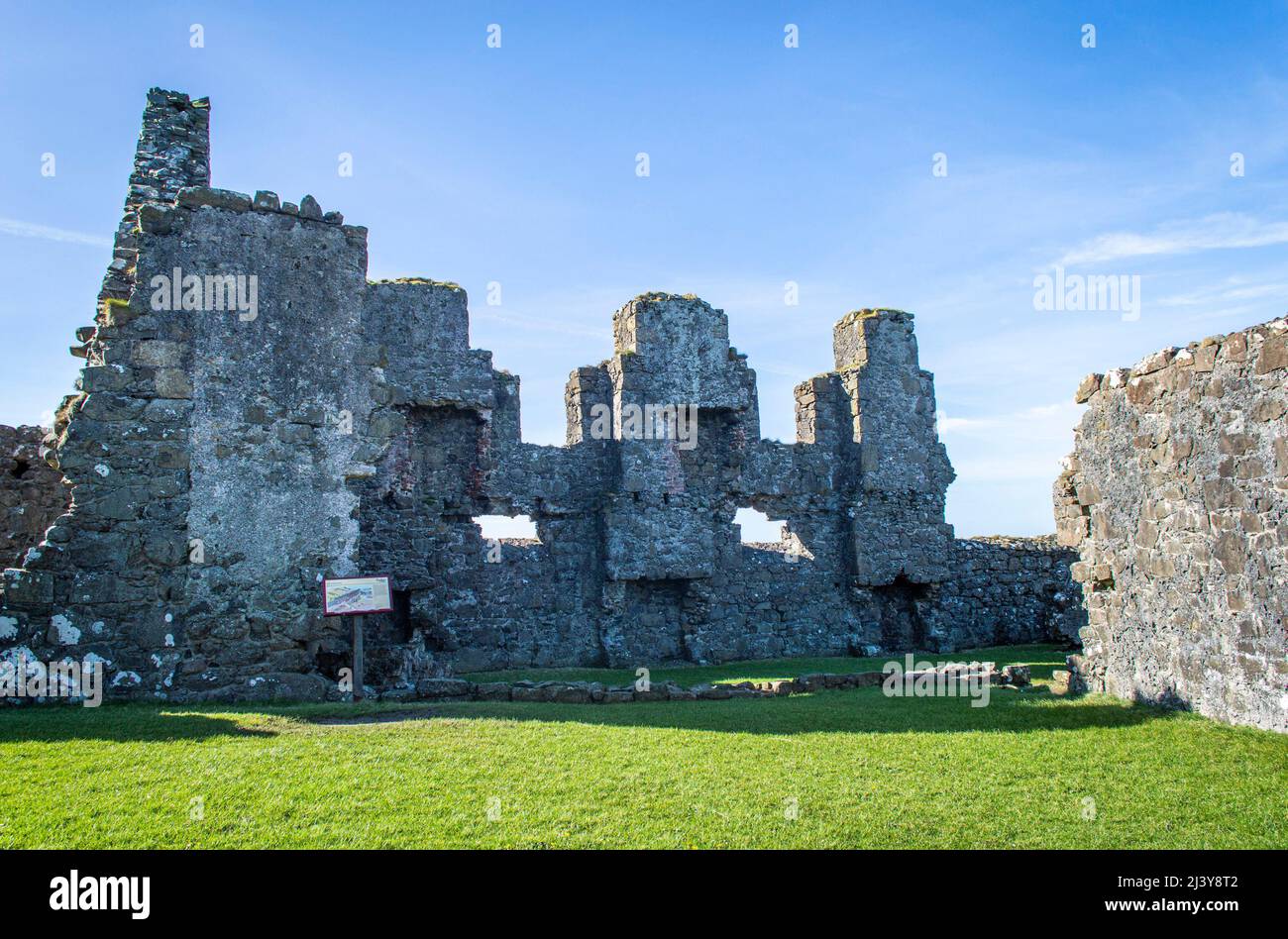 Famous Dunluce Castle ruins at Northern Ireland in a sunny day Stock ...