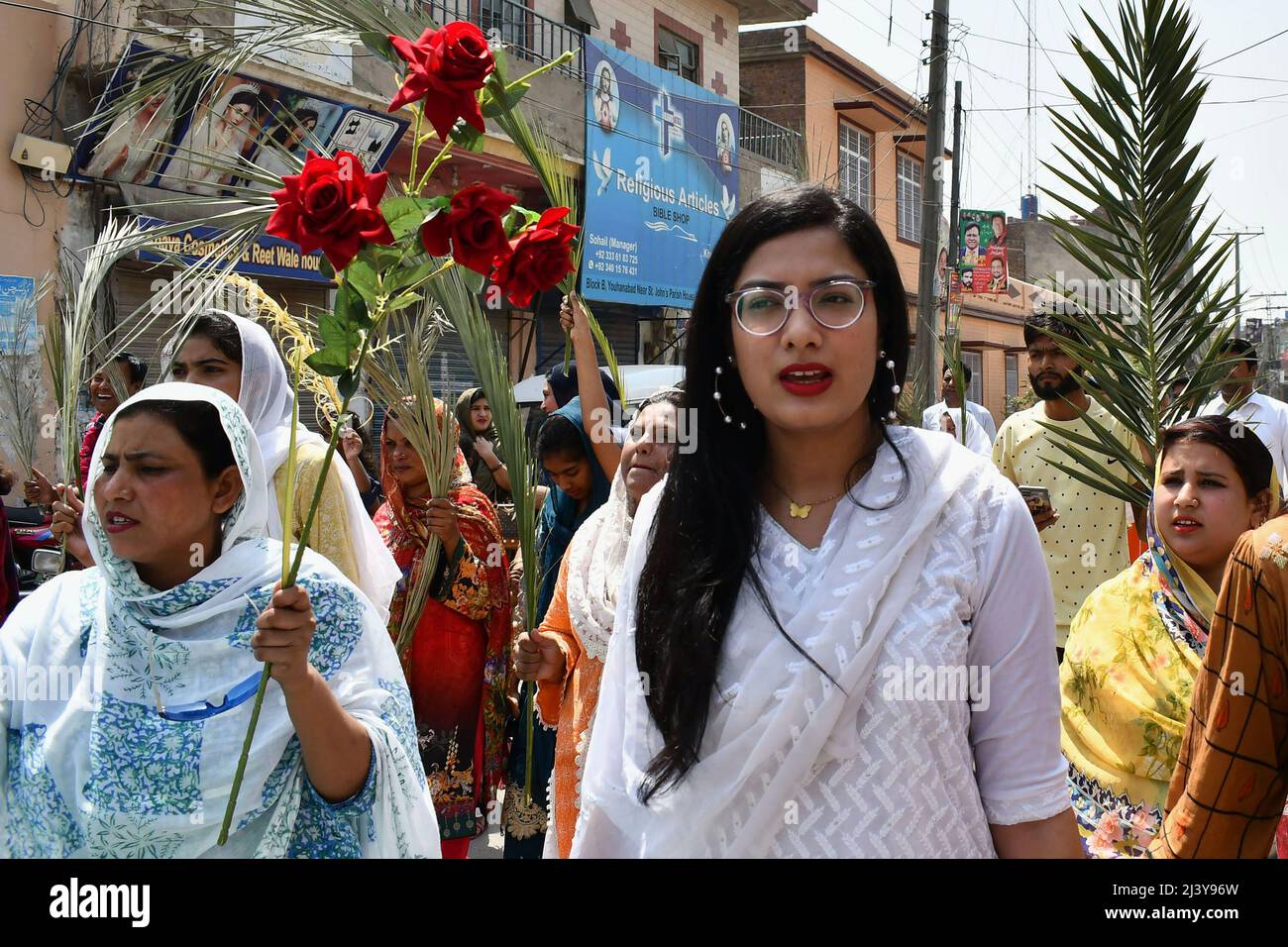 Pakistani Catholic Christian pilgrims march during the Palm Sunday ...