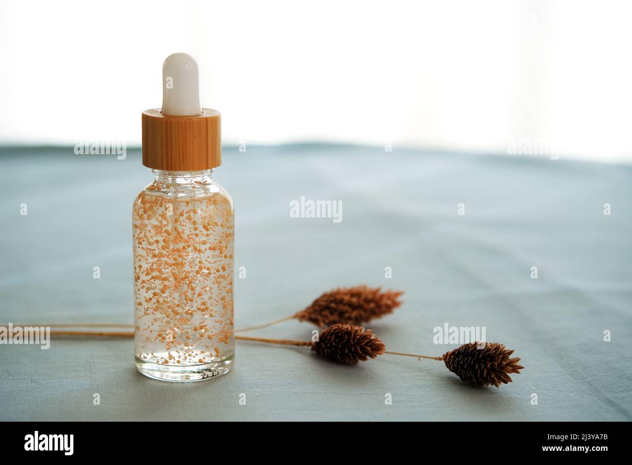 mockup bottle of cosmetic makeup serum dropper product with skincare ...