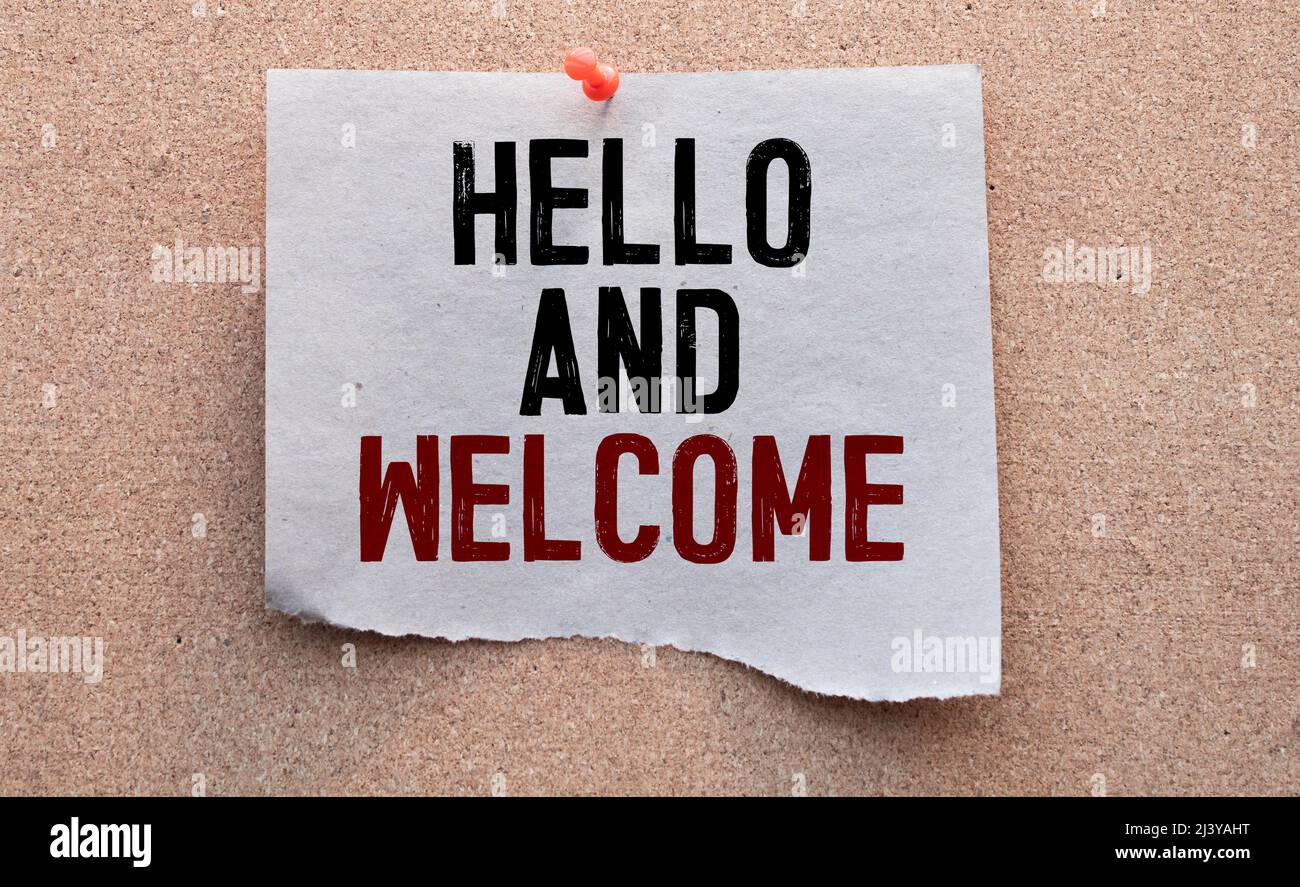 WELCOME text on notice board on top of office desk. Business finance ...