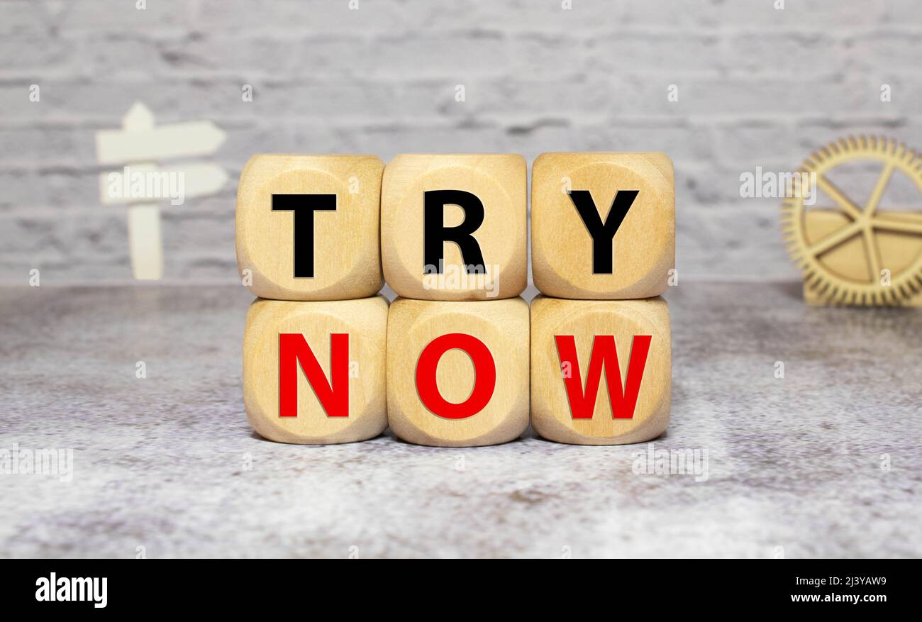 try it now text write on torn paper Stock Photo - Alamy
