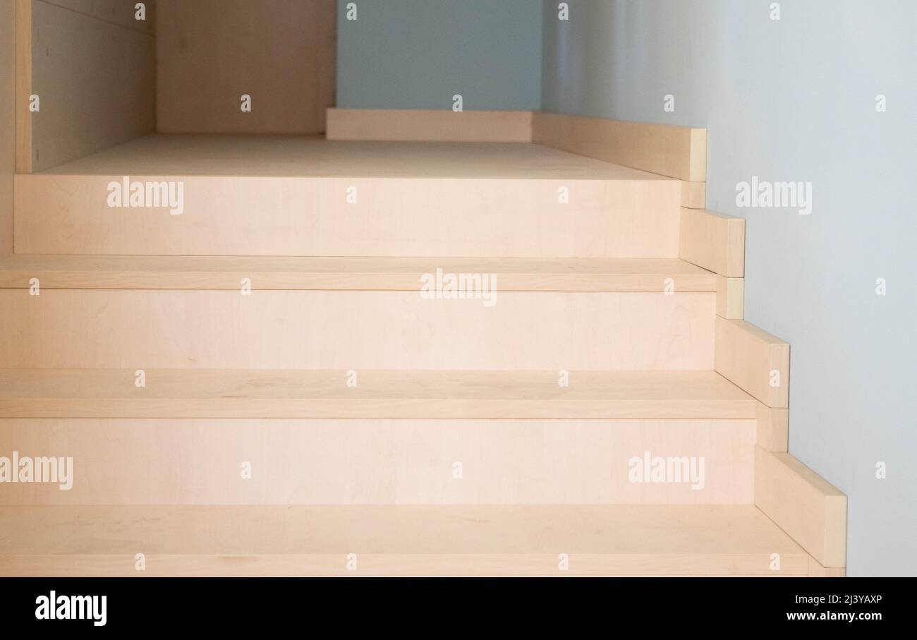 Cantilevered dark wooden staircase . Minimalism style,ascending ...