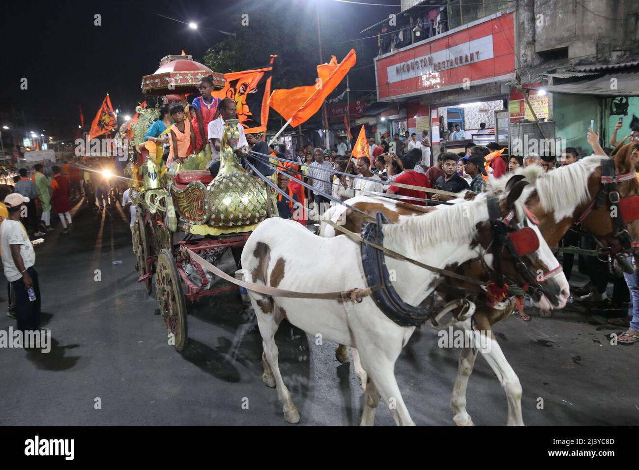 Indian devotees take part in a religious procession to mark the "Ram ...