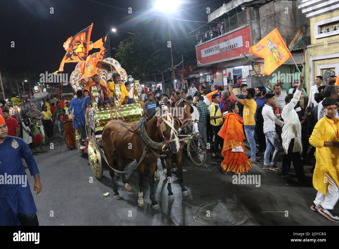Indian devotees take part in a religious procession to mark the "Ram ...