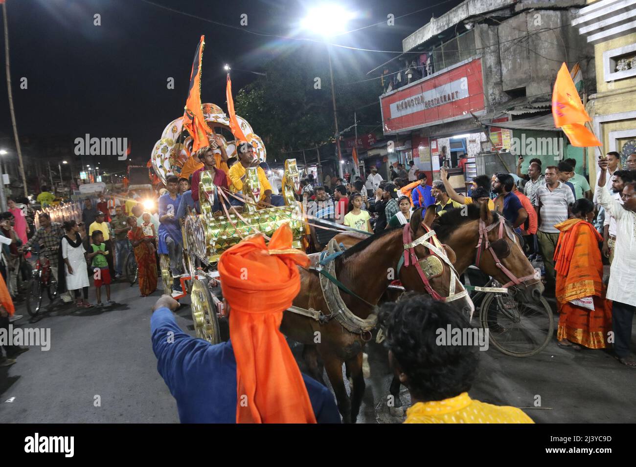Indian devotees take part in a religious procession to mark the "Ram ...