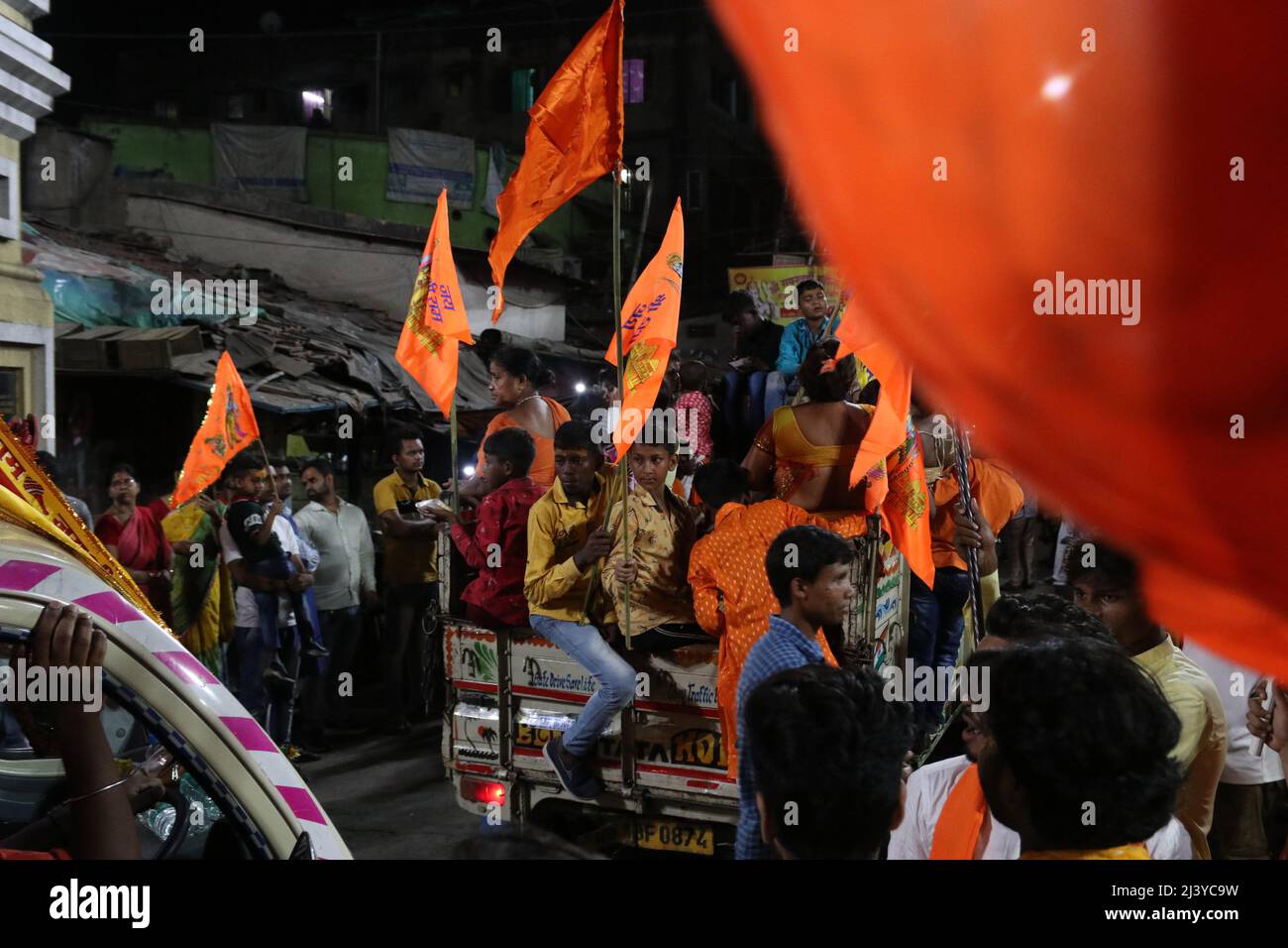 Indian devotees take part in a religious procession to mark the "Ram ...
