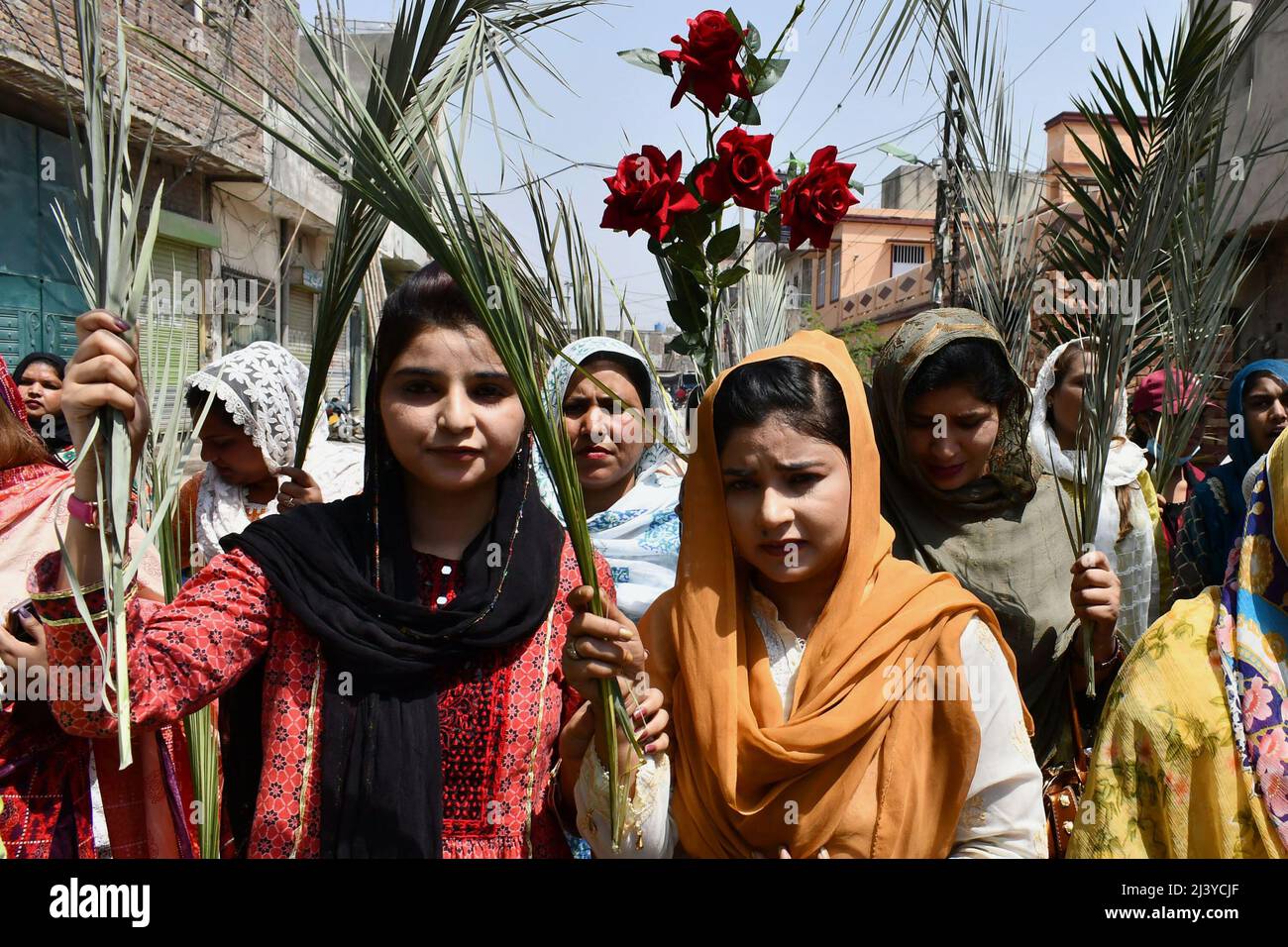 Pakistani Catholic Christian pilgrims march during the Palm Sunday ...