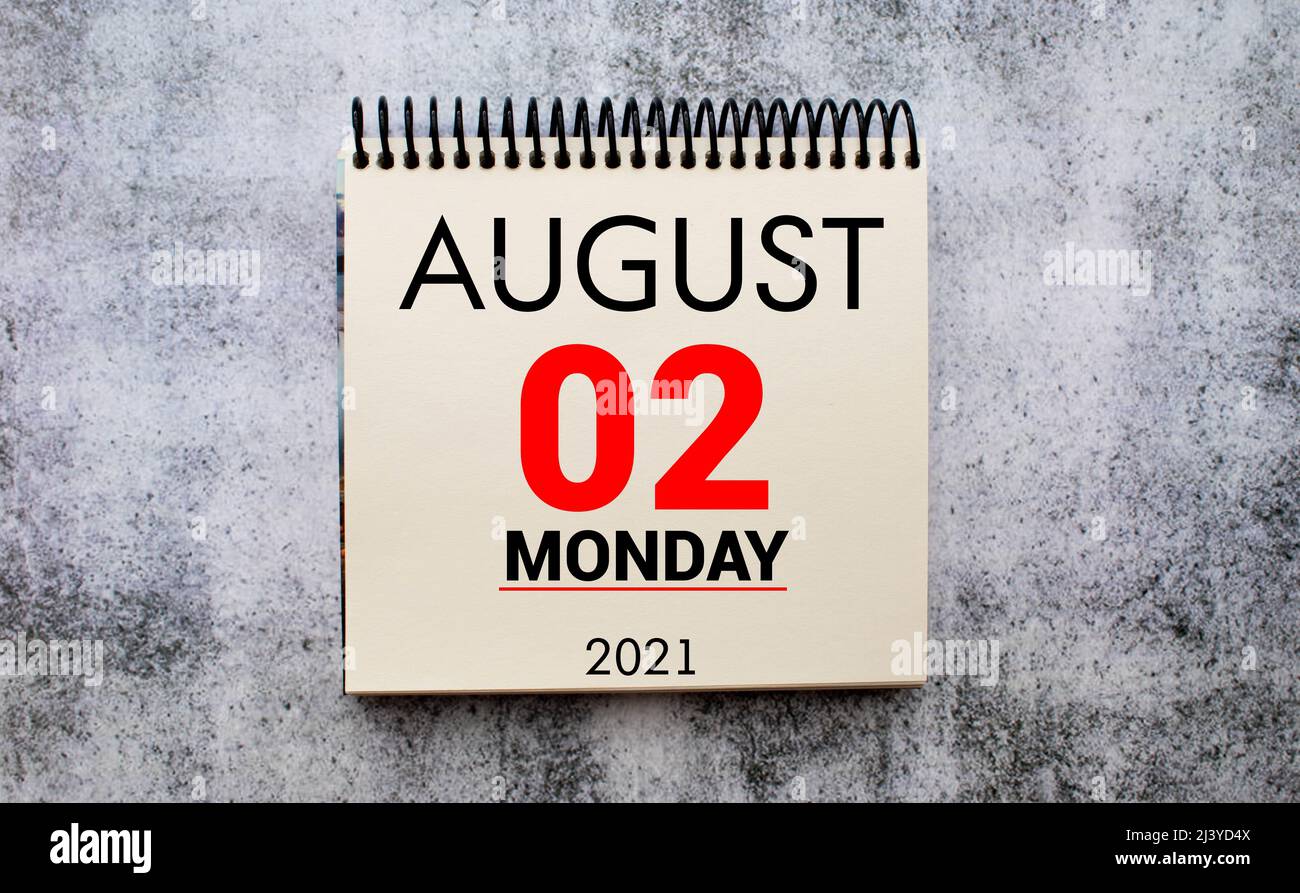 Wall calendar with a red pin - August 02 Stock Photo - Alamy