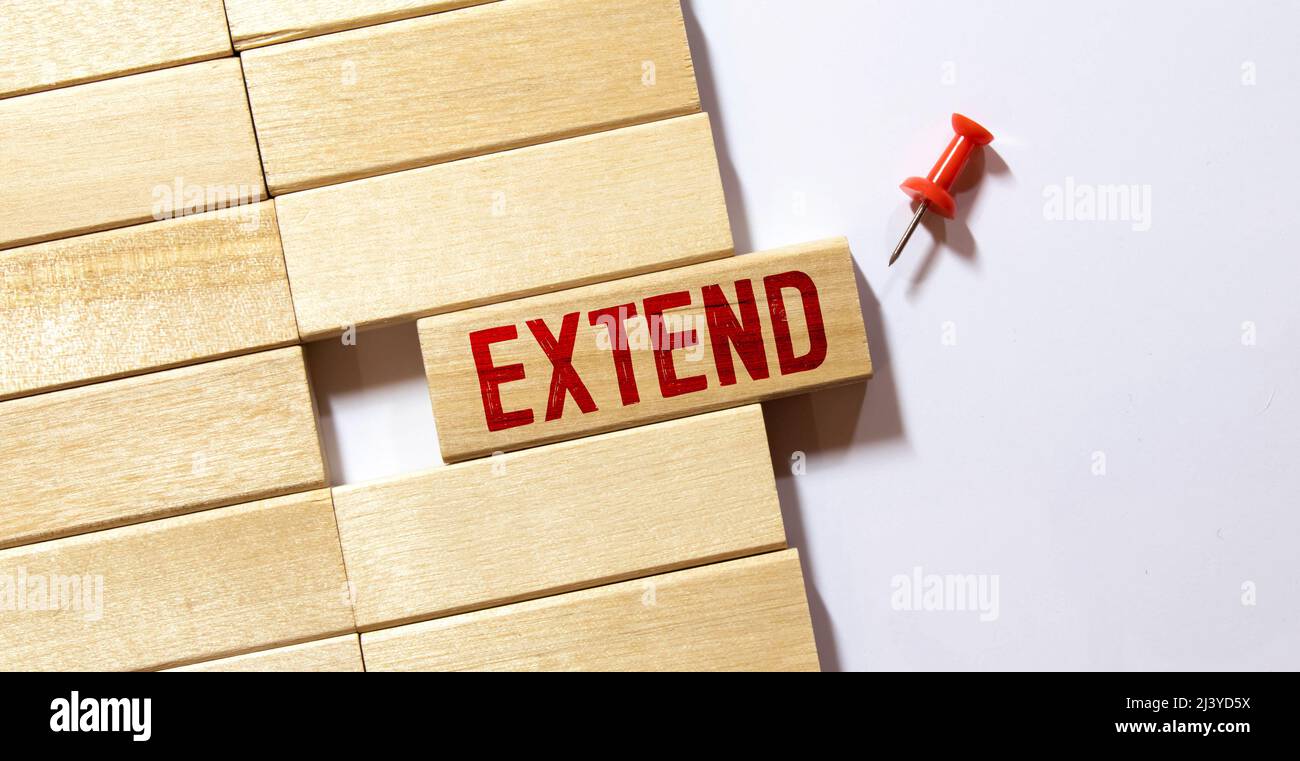 EXTENDED word made with building blocks Stock Photo - Alamy
