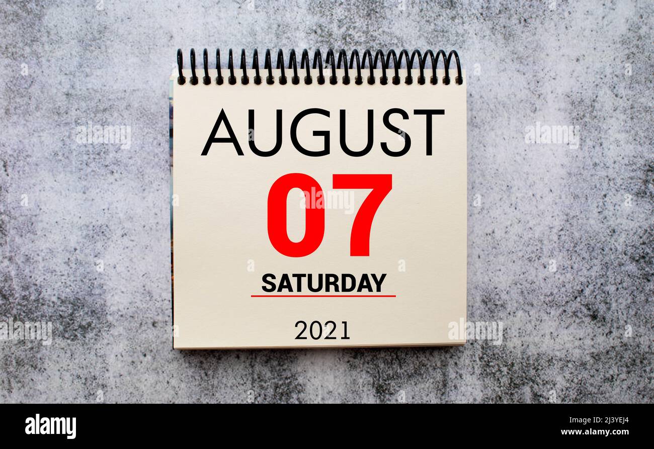 August 07, date on the calendar. Handmade wood cube with date month and ...