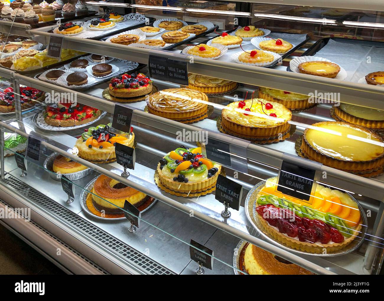 Assorted pies, tart in the pastry shop window Stock Photo - Alamy